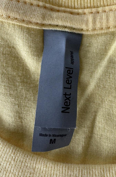 Next Level Women's Puma Graphic Yellow Short Sleeve Shirt Size Medium